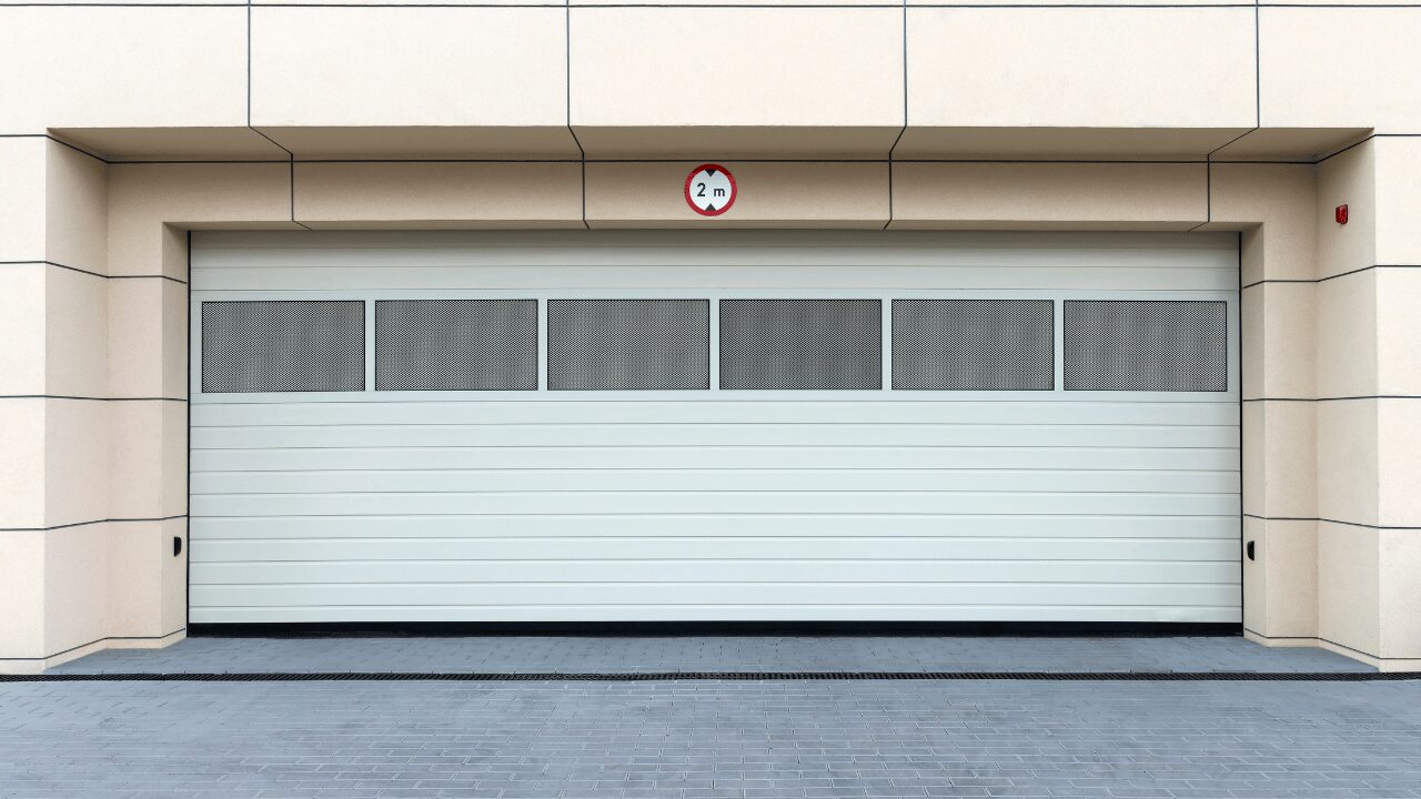 Why Is One Side Of My Garage Door Slightly Higher Than Other?